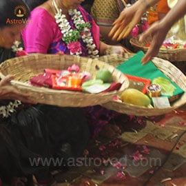 Sumangali Pooja (special pooja to an elderly married woman) on the fin